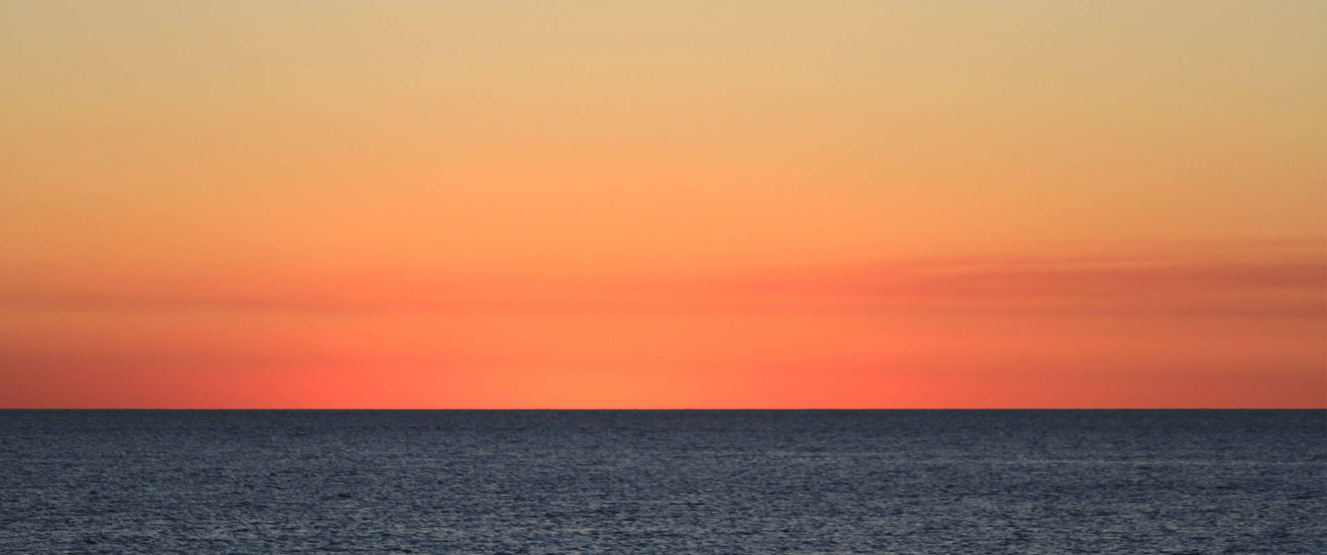Wallpaper Decline Sea Orange Vibrant 4k Iphone Wallpaper Featuring A